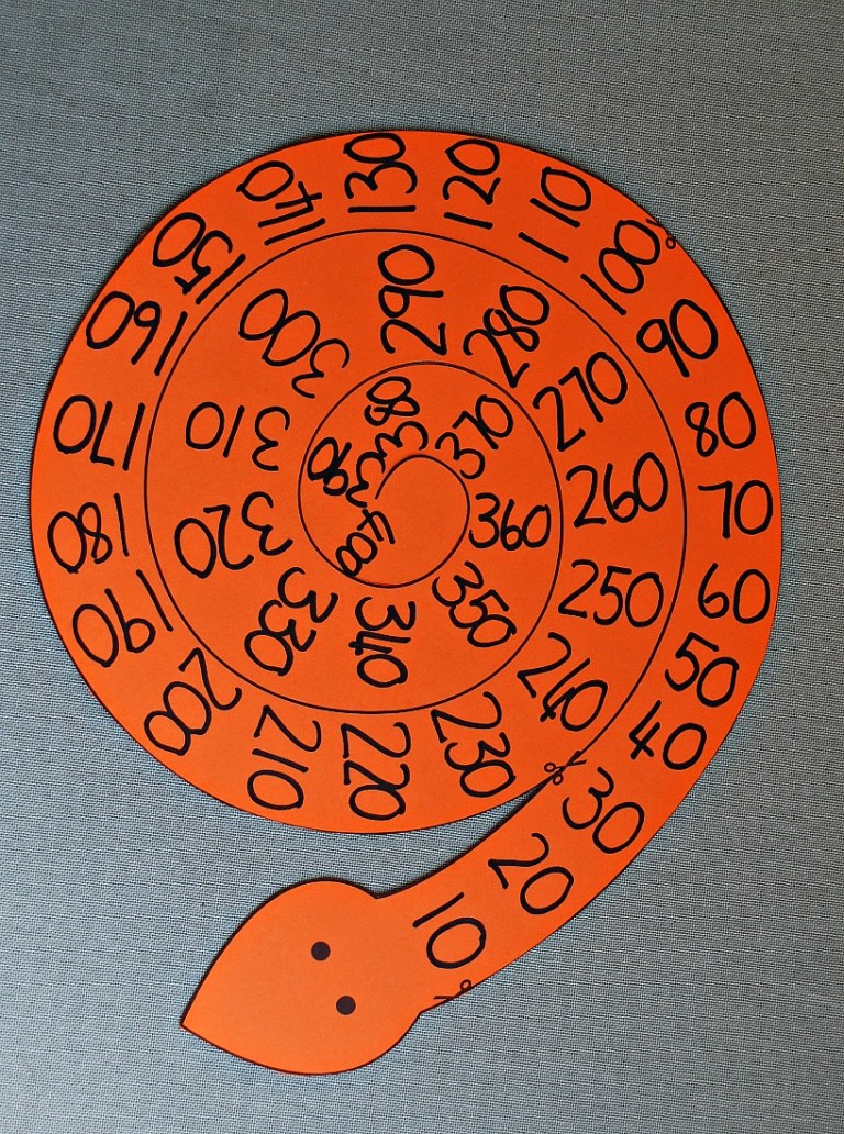 Skip Counting Spiral Snakes | ofamily learning together